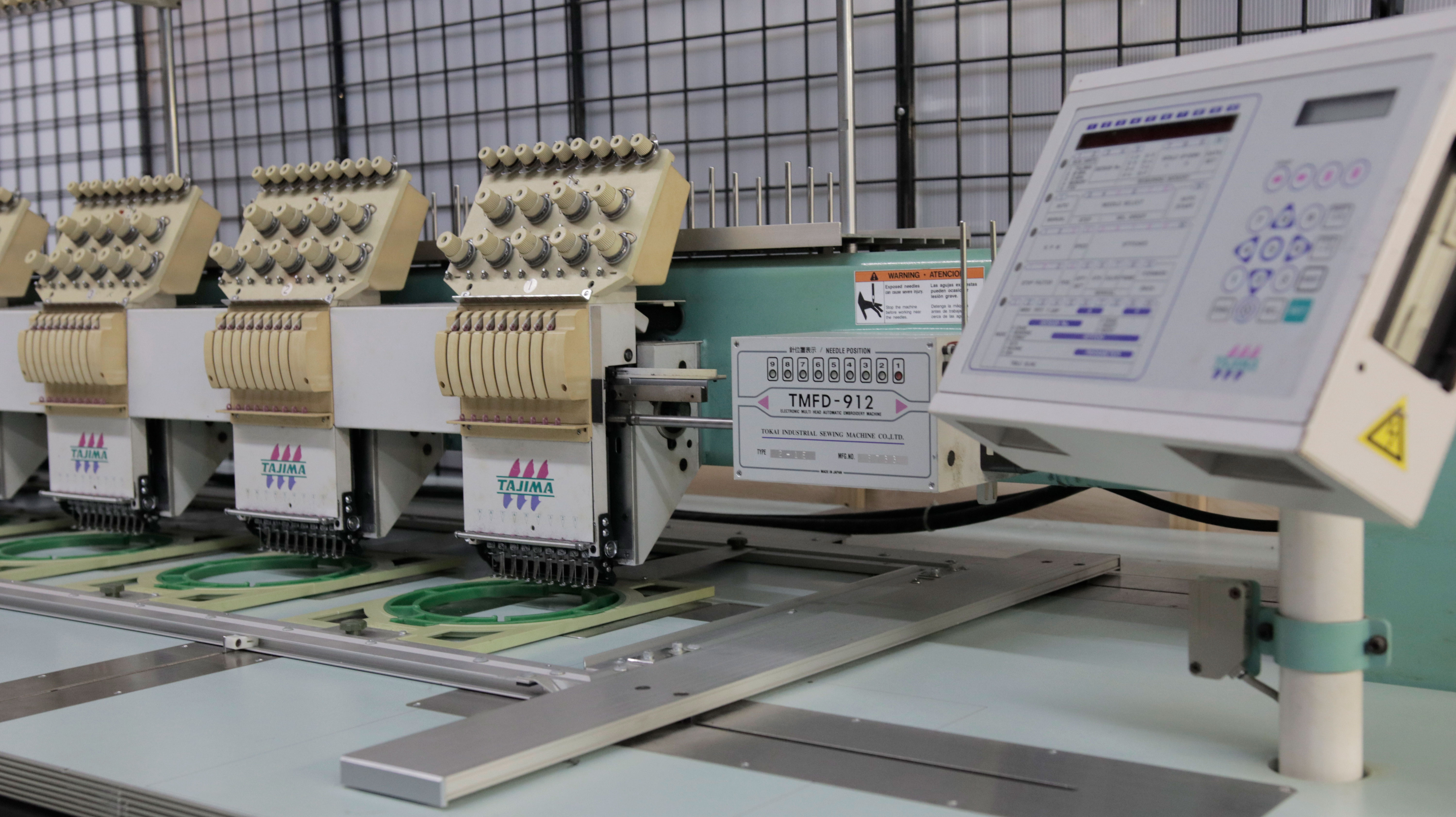 Tajima TMFD-912 - 12 Heads - 9 Needles - Commercial Embroidery Machine